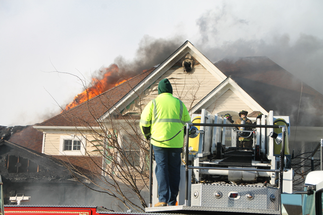 Firefighters battle house fire on Alfred Avenue in Calverton ...