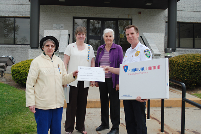Group presents Riverhead P.D. with check for safety vest - Riverhead ...